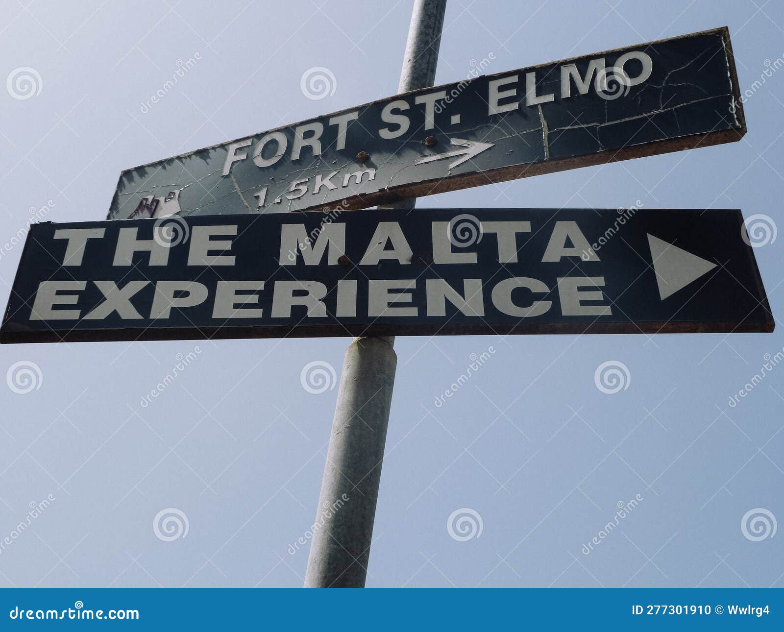 The Malta Experience Direction Sign Stock Photo - Image of text, lane ...