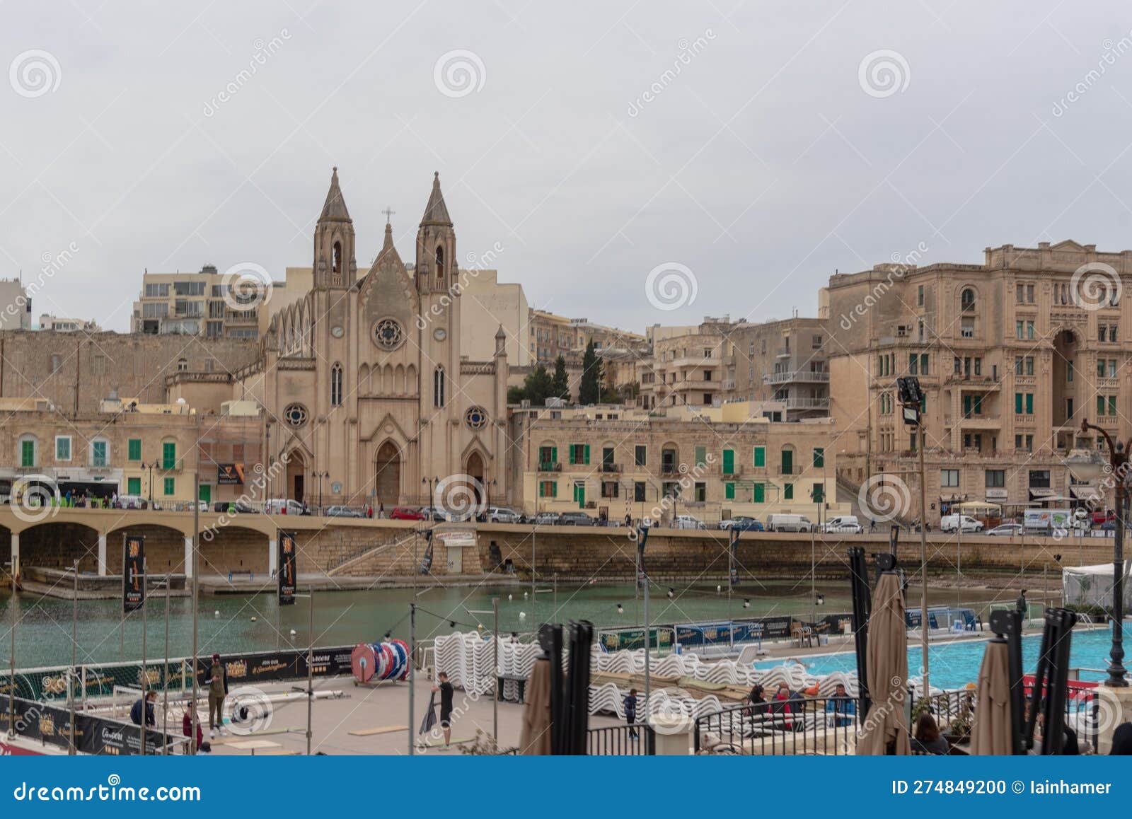 BALLUTA BAY, ST JULIANS, MALTA - OCTOBER 31ST 2019: Water Flows From ...