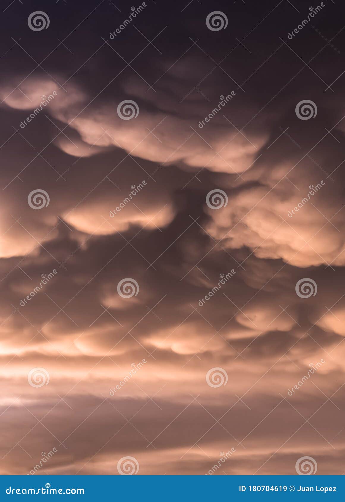 Mammoth Clouds Over the Sky with Warm Tones Stock Image - Image of ominous, clouds: 180704619