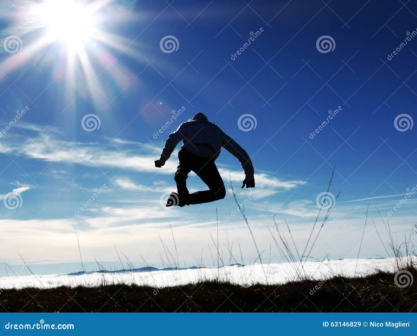 Man Above between Ground and Sky Stock Image - Image of fast, energy ...