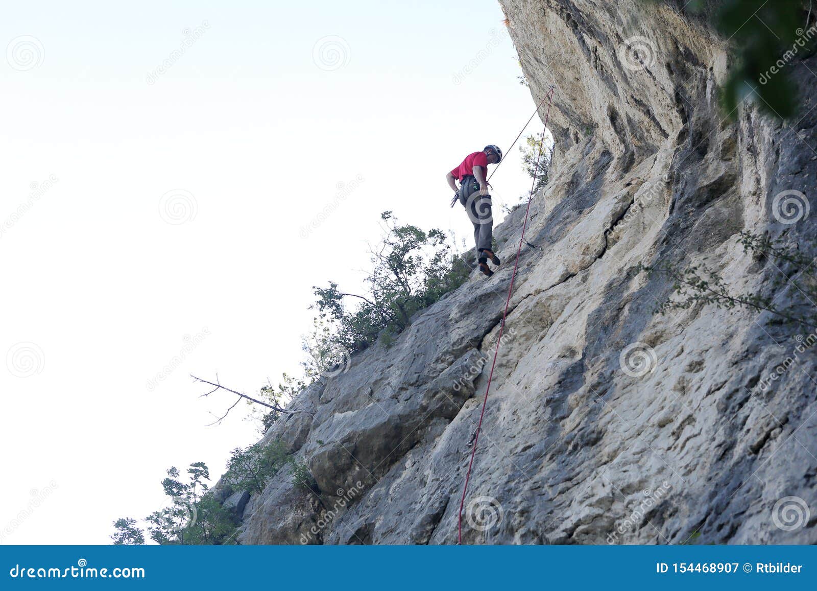 Man is Abseiling on a Rock Wall Stock Image - Image of grip, adventure ...