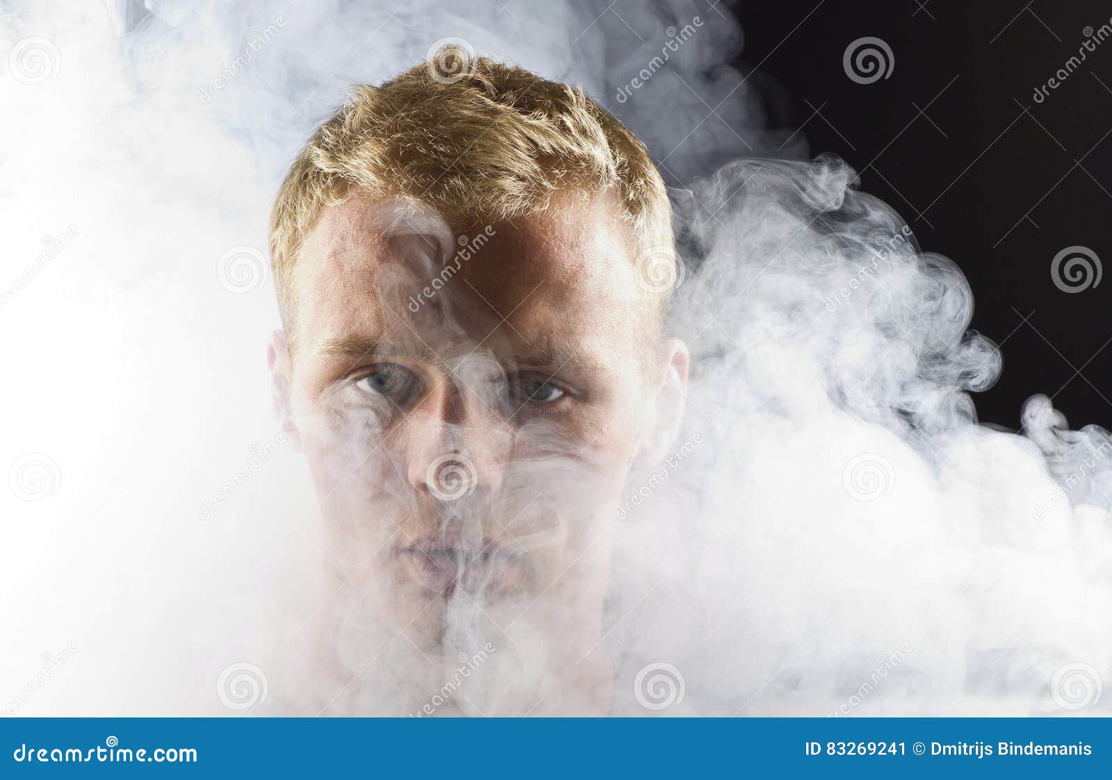 A man in abstract smoke stock image. Image of mistery - 83269241