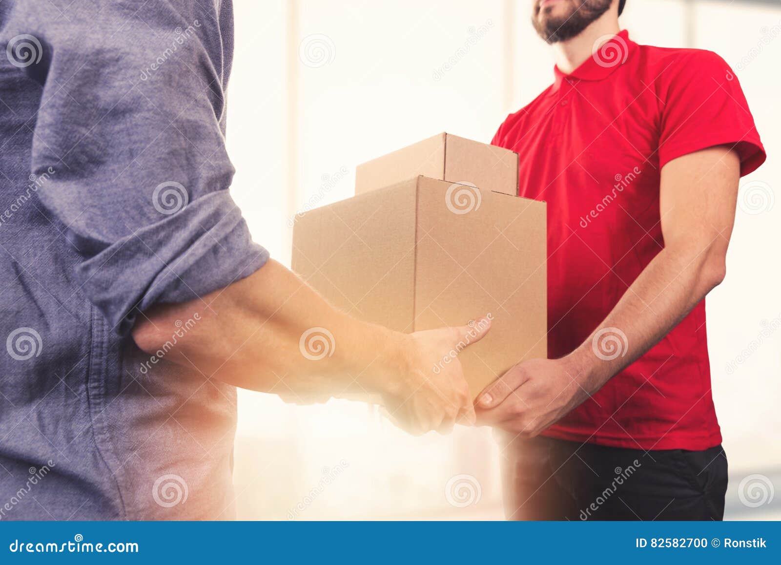 Man Accepting a Delivery of Boxes from Delivery Service Courier Stock ...