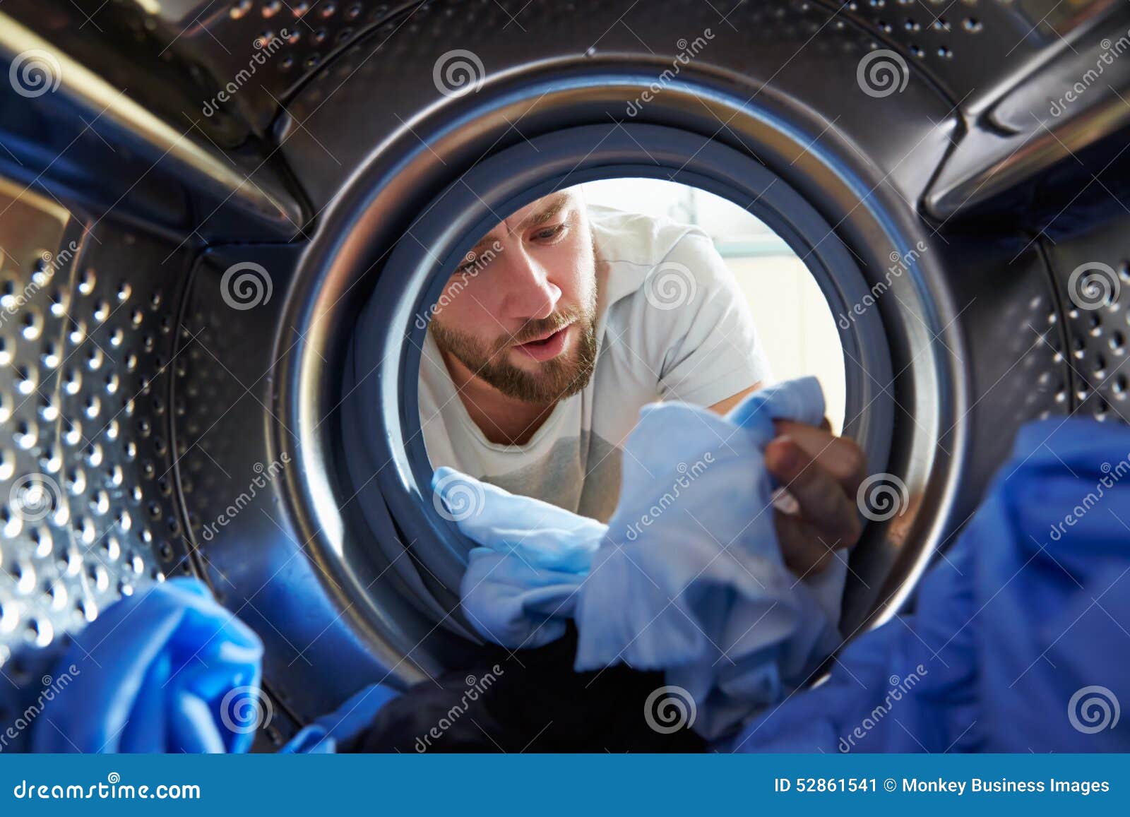 Man Accidentally Dyeing Laundry Inside Washing Machine Stock Image ...