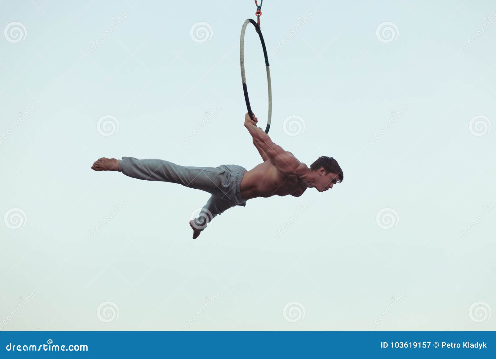 Man is an Acrobat High in the Sky. Stock Image - Image of exercising ...