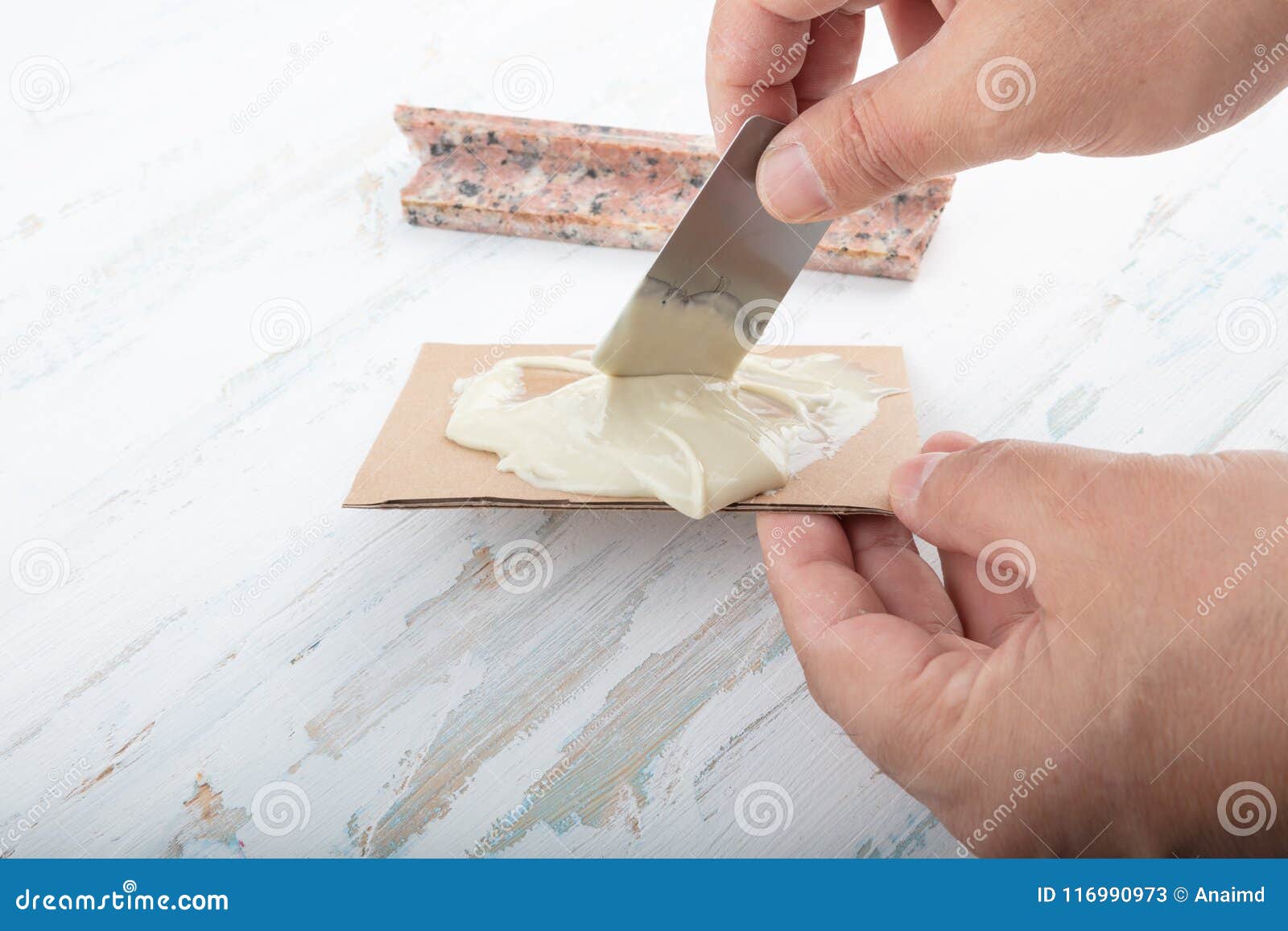 Man Adding Adhesive A Broken Marble With A Spatula Royalty-Free Stock ...