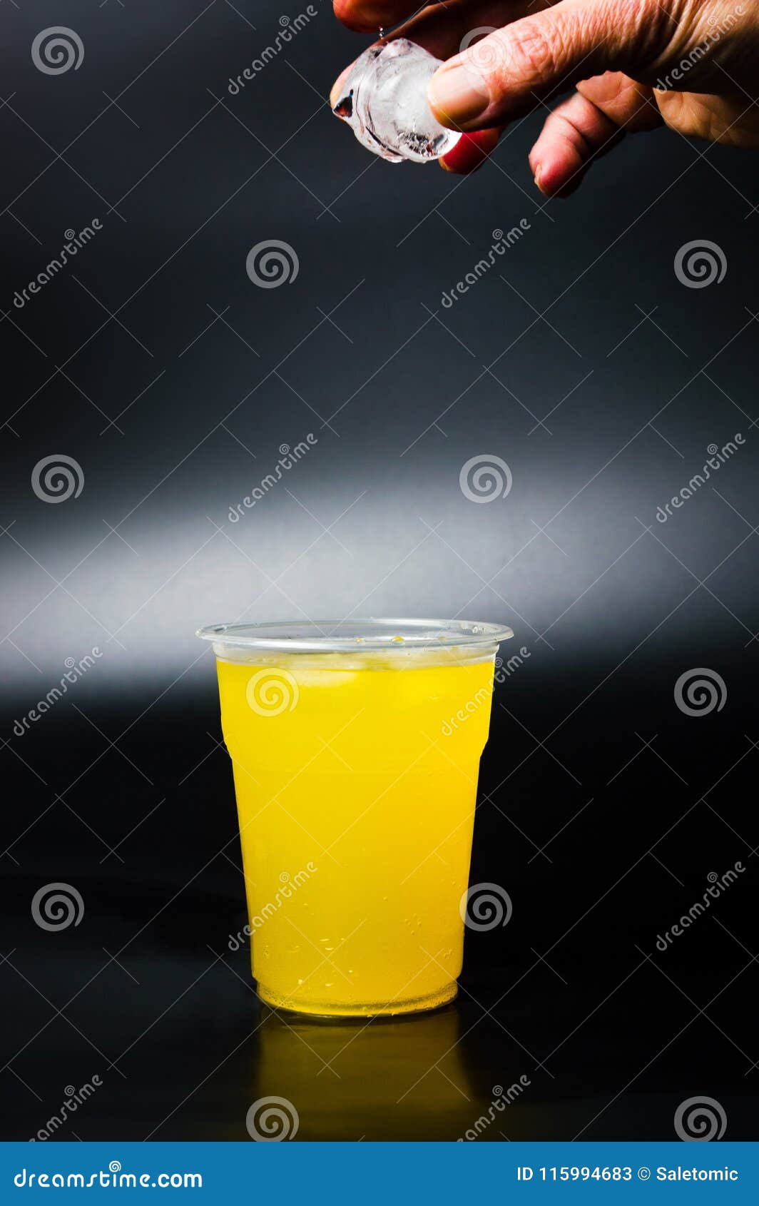 Man Adding Ice into Orange Juice Stock Image - Image of citrus ...