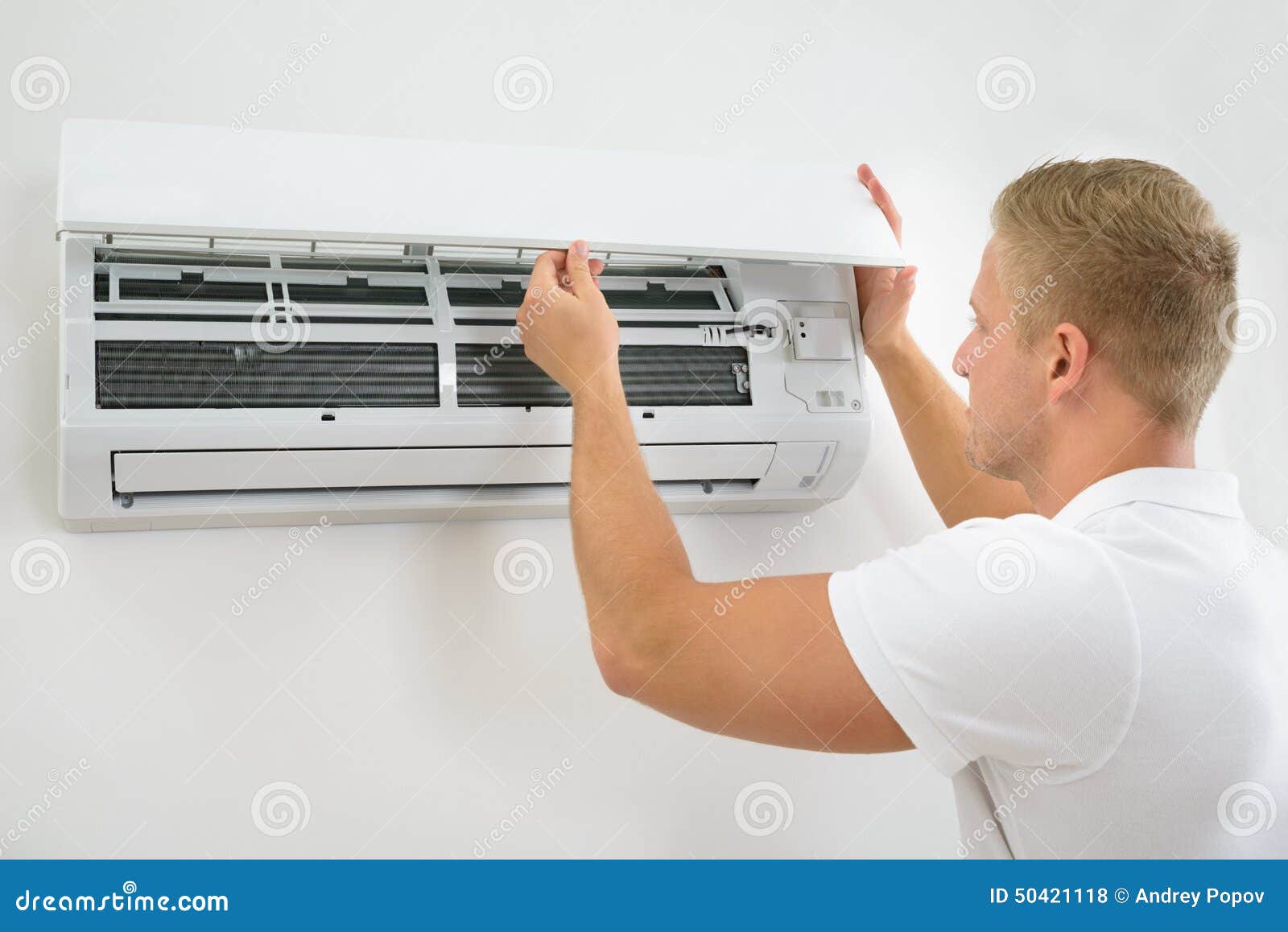 Man Adjusting Air Conditioning System Stock Photo - Image of adjustment ...