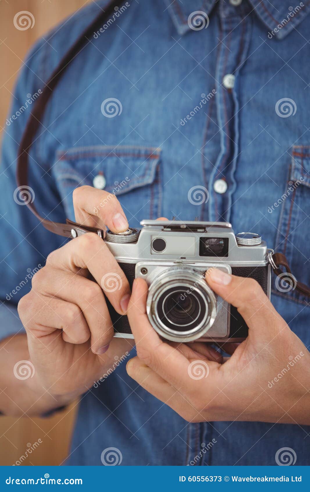 Man adjusting camera lens stock image. Image of closeup - 60556373