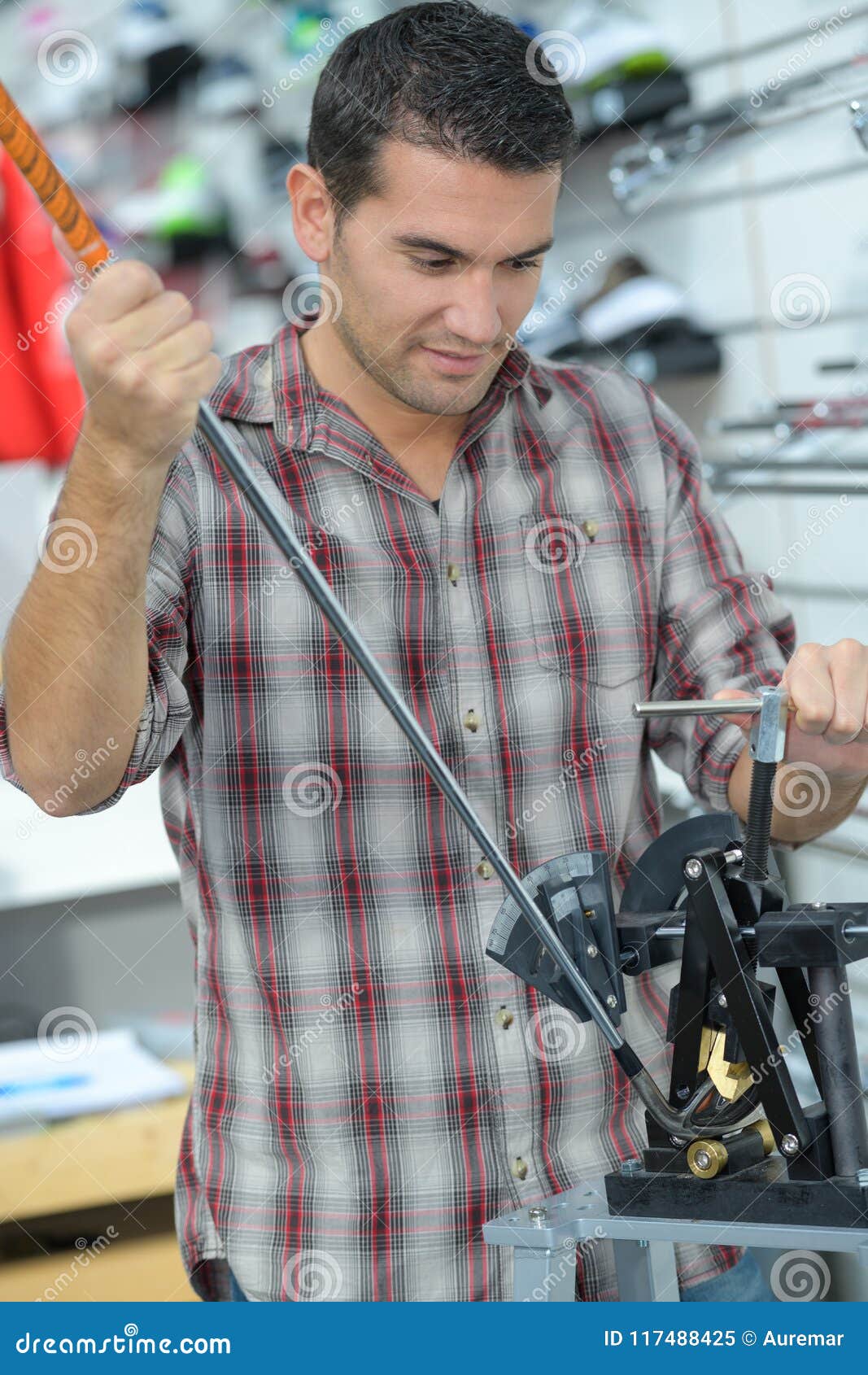 Man adjusting golf club stock image. Image of golf, male - 117488425