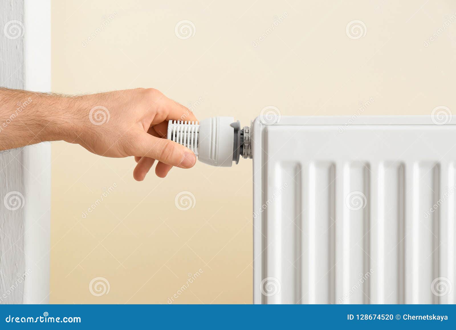 Man Adjusting Heating Radiator Thermostat Stock Photo - Image of home ...