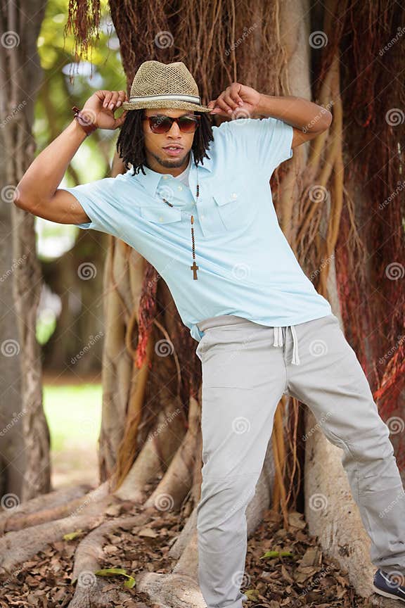 Man adjusting his hat stock photo. Image of handsome - 24987484