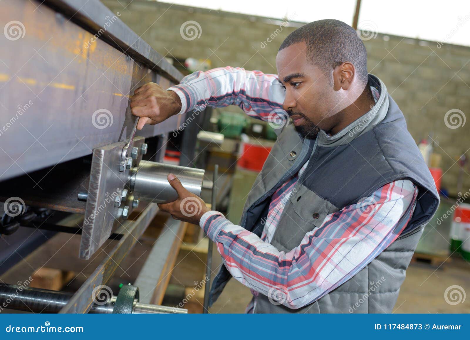 Man Adjusting Machine with Spanner Stock Image - Image of machinery ...