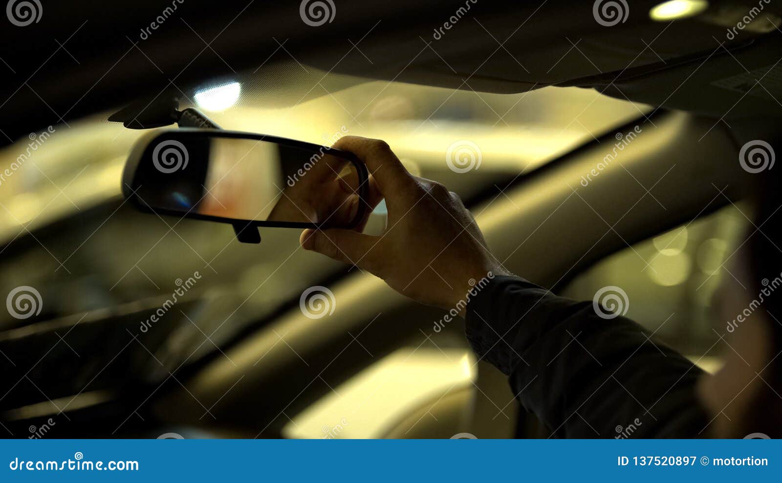 Man Adjusting Rear View Mirror in Car, Driving License Exam, Visibility ... Man Adjusting Rear View Mirror in Car, Driving License Exam, Visibility ...
