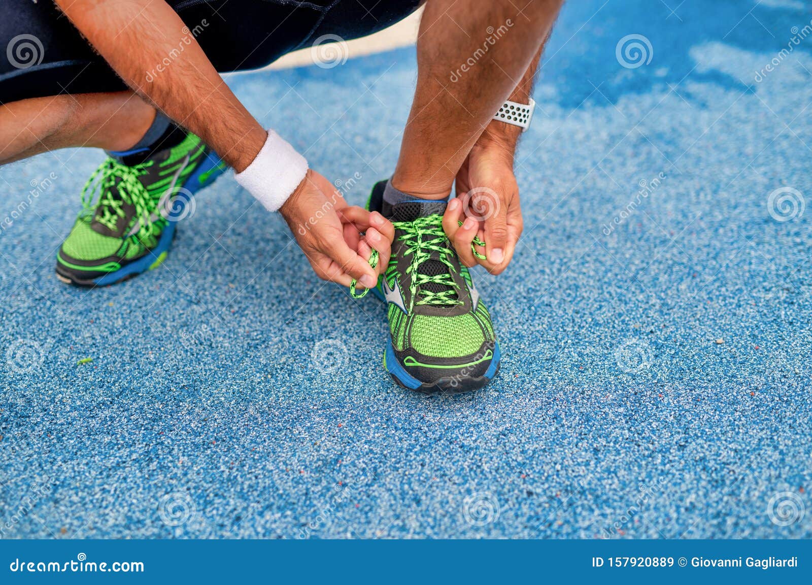 Man Adjusting Sport Shoes Laces Stock Image - Image of class, challenge ...
