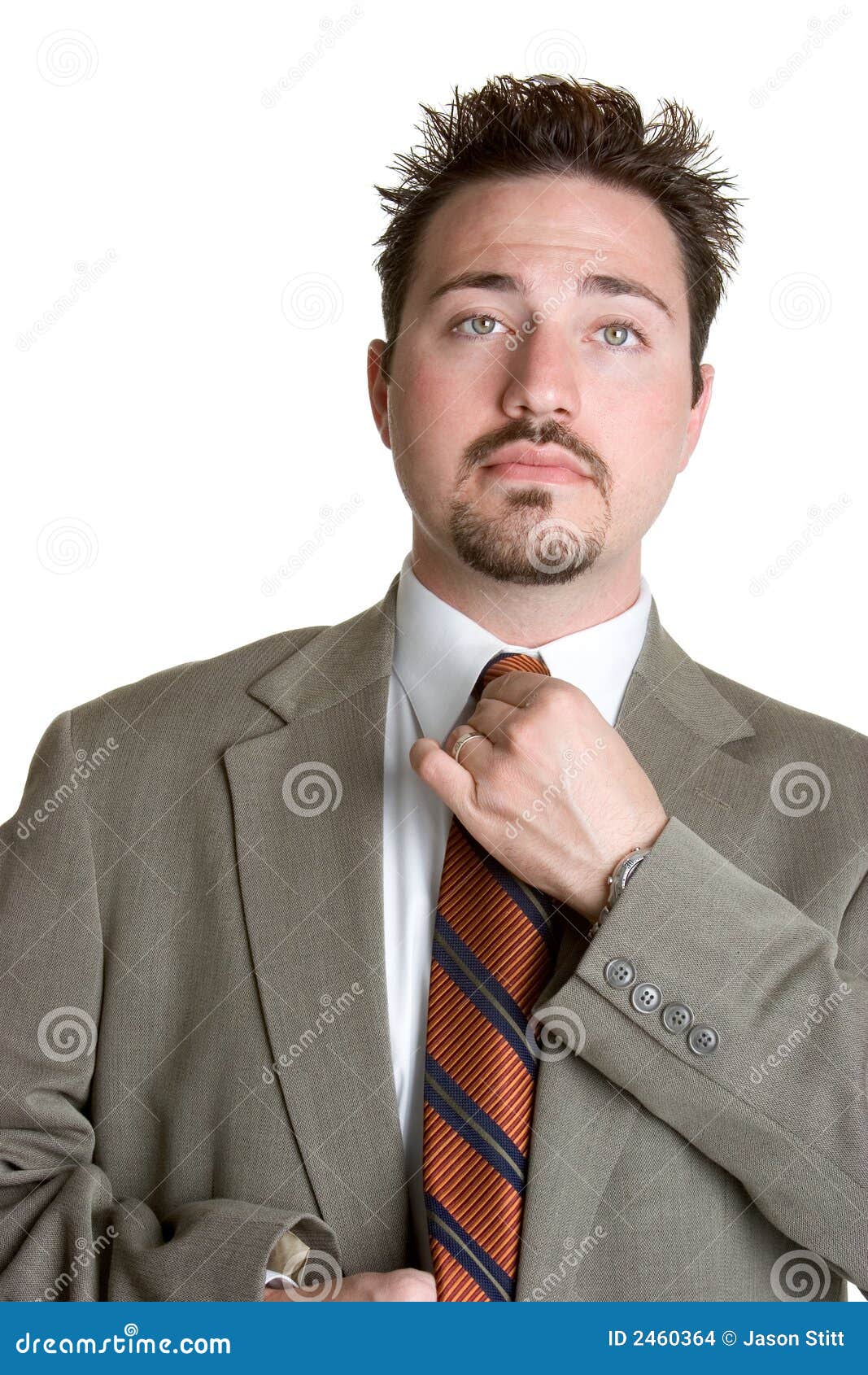 Man Adjusting Tie stock photo. Image of professional, adult - 2460364