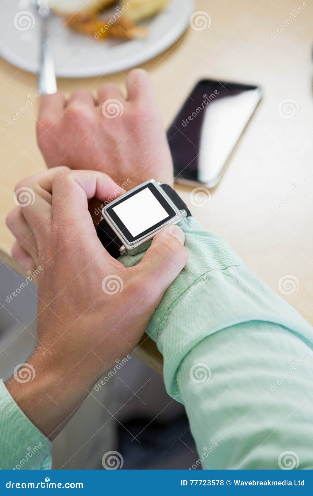 Man Adjusting Time on His Smartwatch Stock Photo - Image of hotel ...