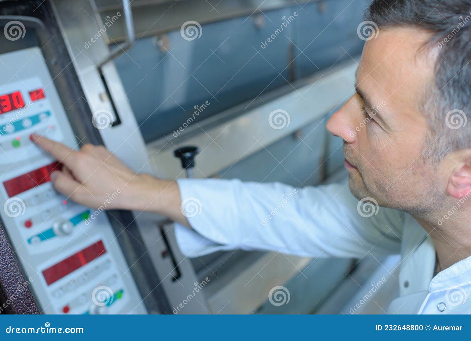 Man adjusting timer stock photo. Image of tender, industrial - 232648800