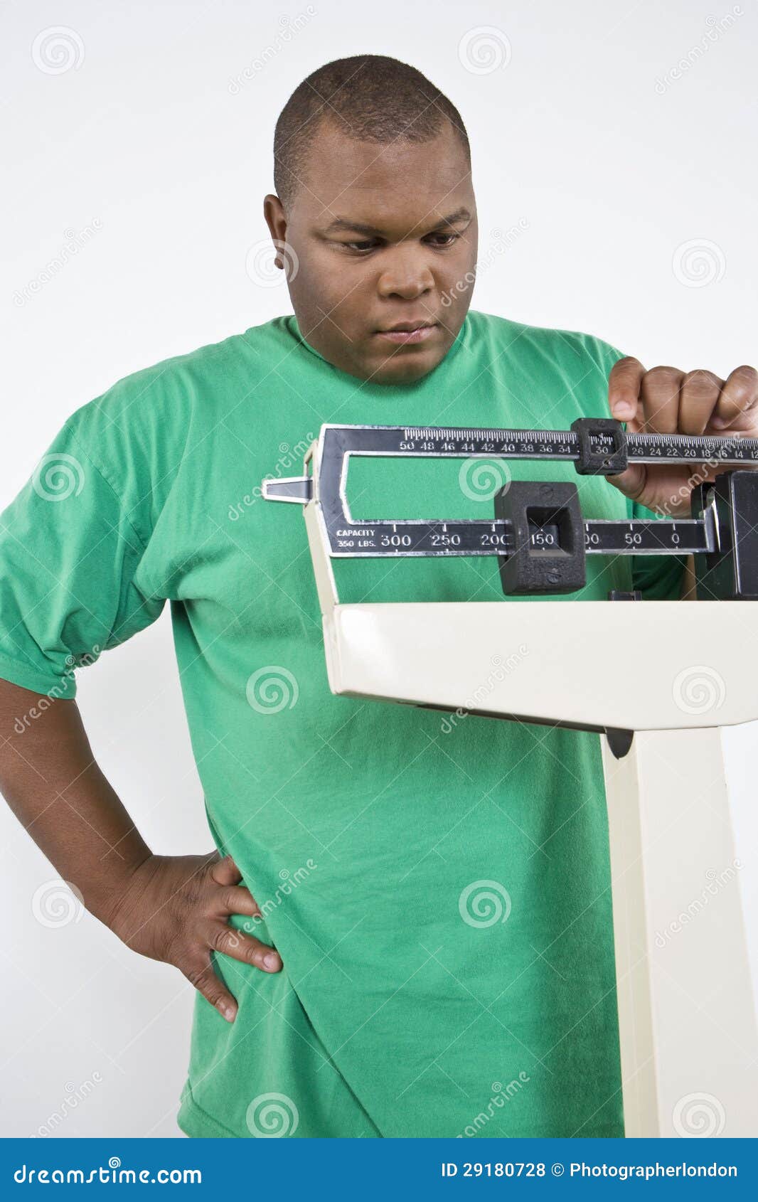 Man Adjusting Weight Scale at Clinic Stock Photo - Image of adult ...