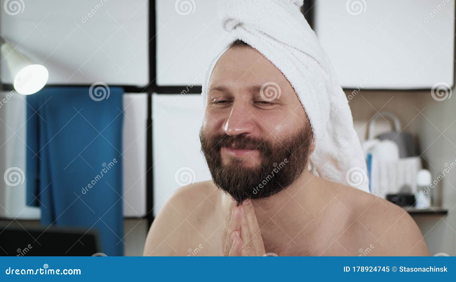 Man Admires Himself Travesty Attractive Guy With Towel On His Head In
