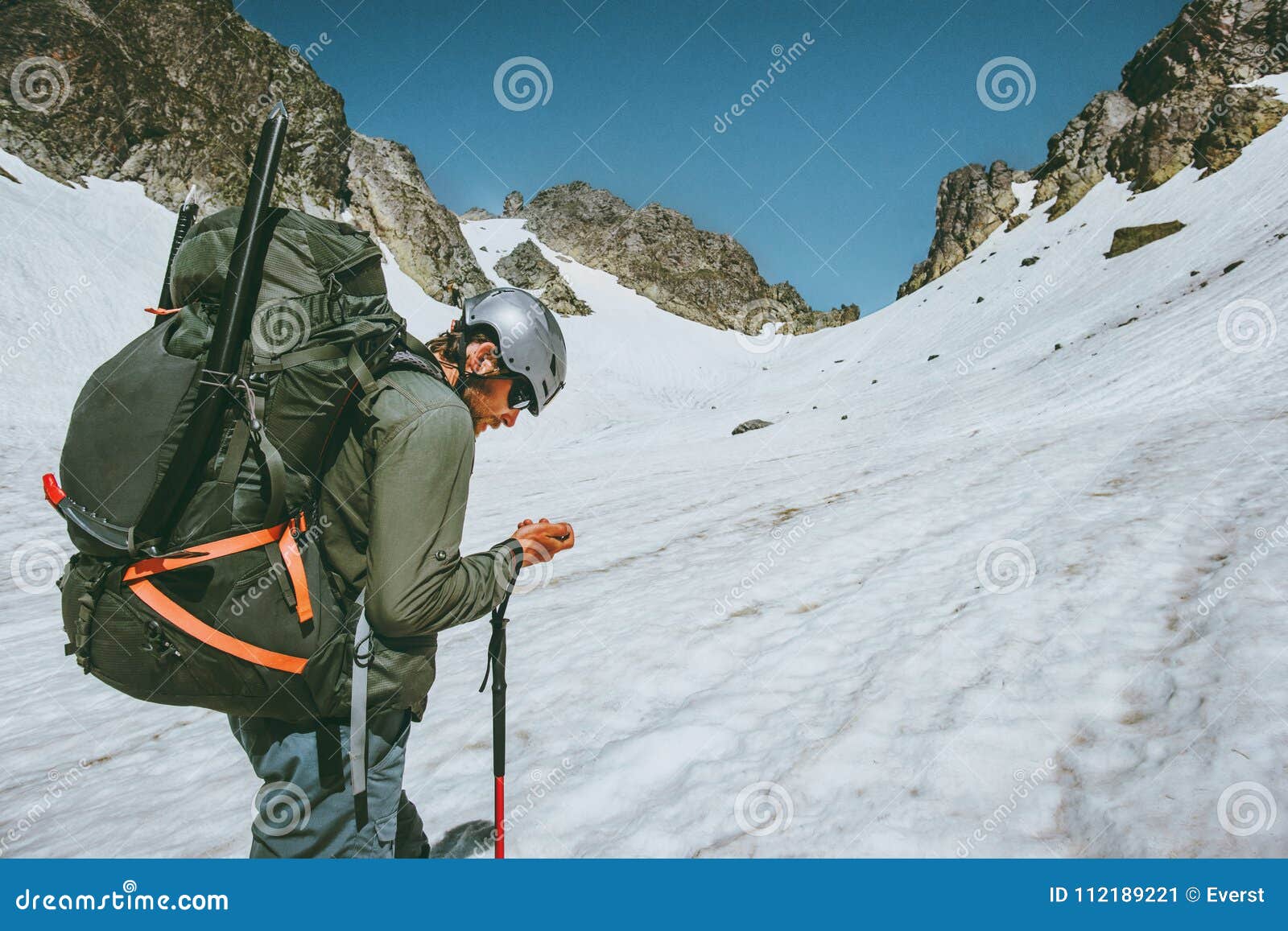 Man Adventurer with Gps Tracker Navigator Checking Location Coordinates ...