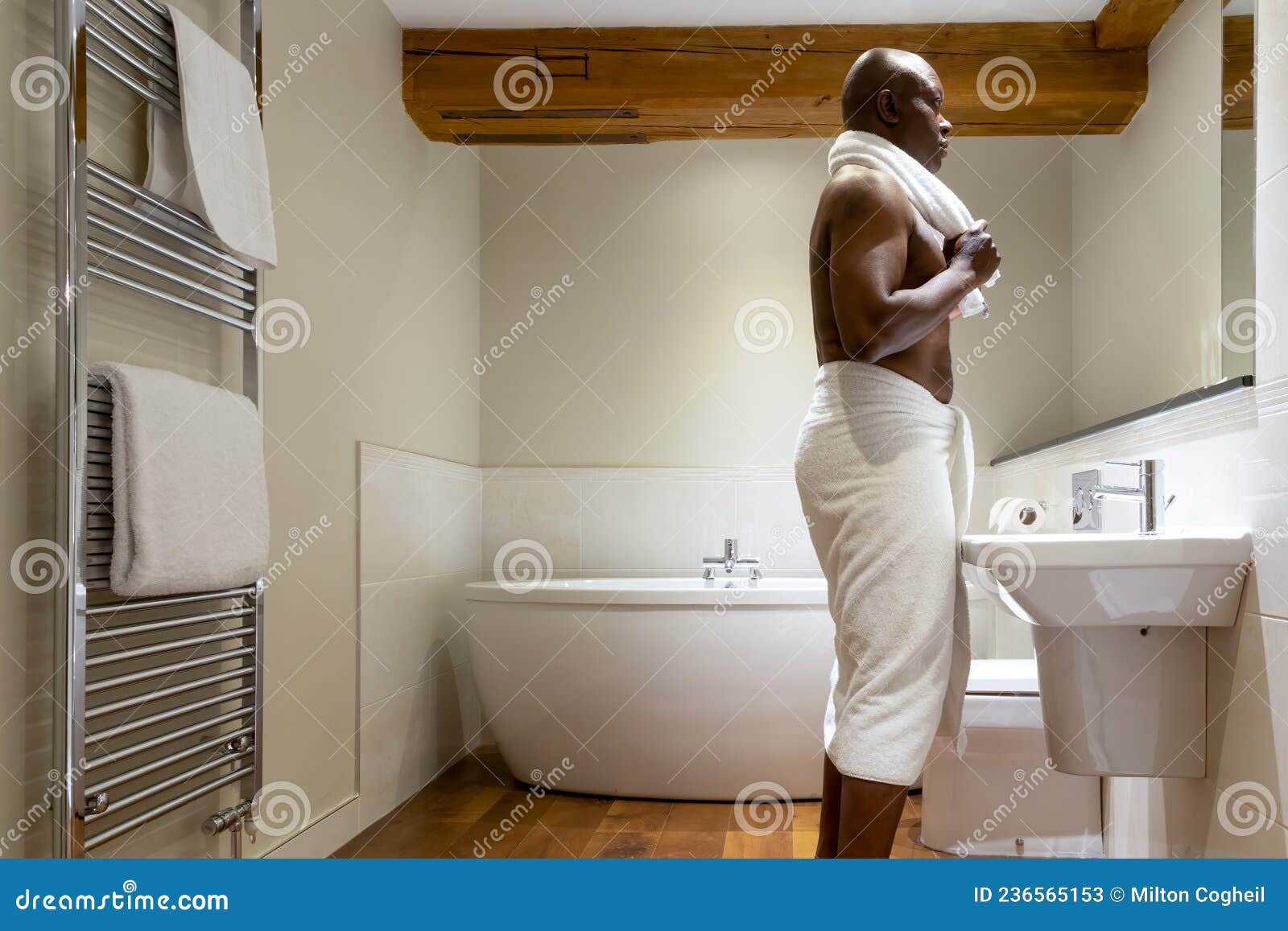 Man of African Ethnicity in a Modern Bathroom Stock Image - Image of ...