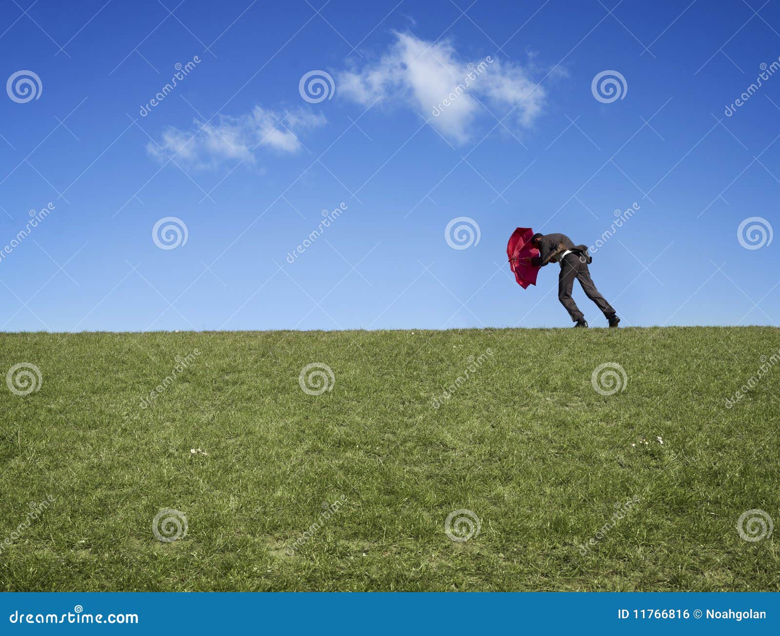 Man against wind stock photo. Image of grass, wind, struggling - 11766816