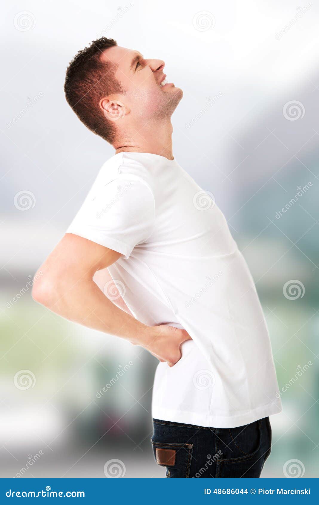 Man in Agony with Back Pain Stock Photo - Image of anatomy, male: 48686044