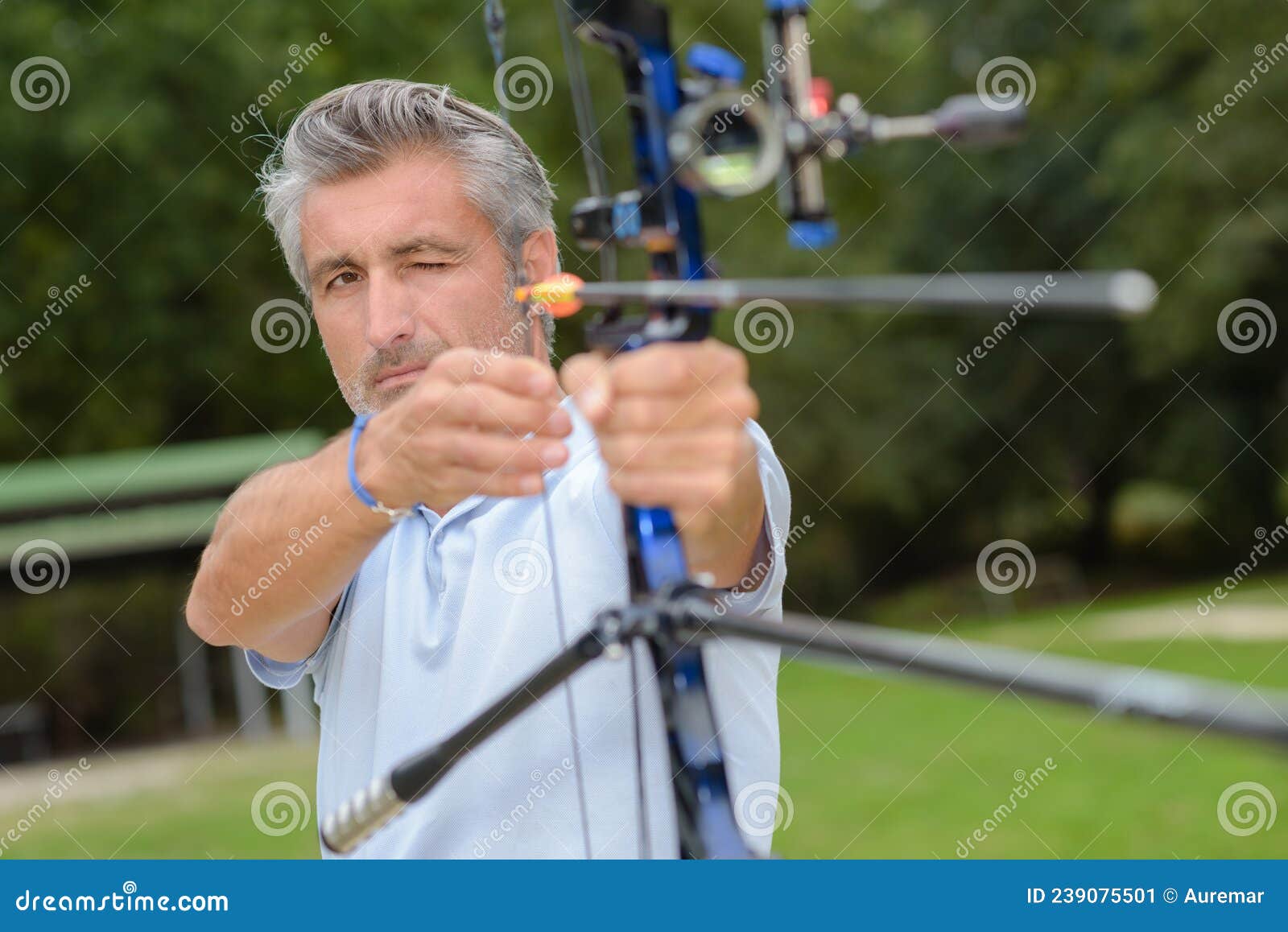 Man aiming archery bow stock image. Image of weapon - 239075501