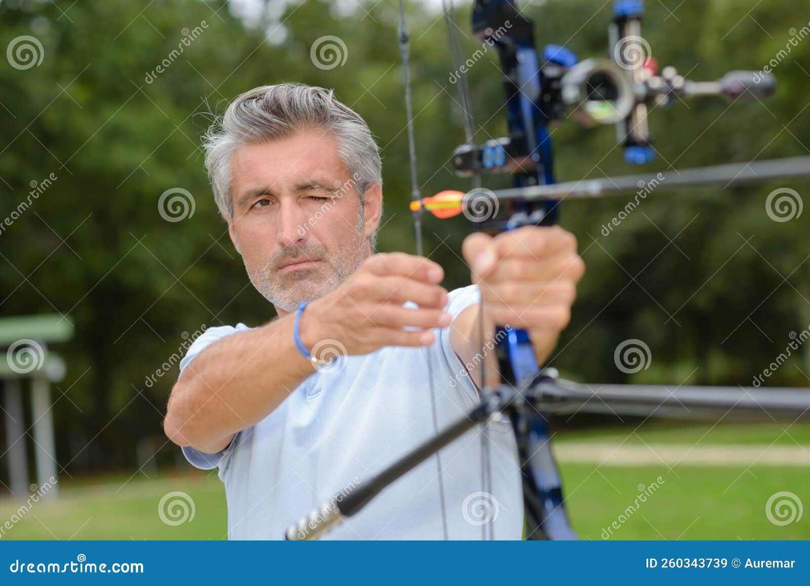 Man aiming bow and arrow stock image. Image of align - 260343739 Man aiming bow and arrow stock image. Image of align - 260343739