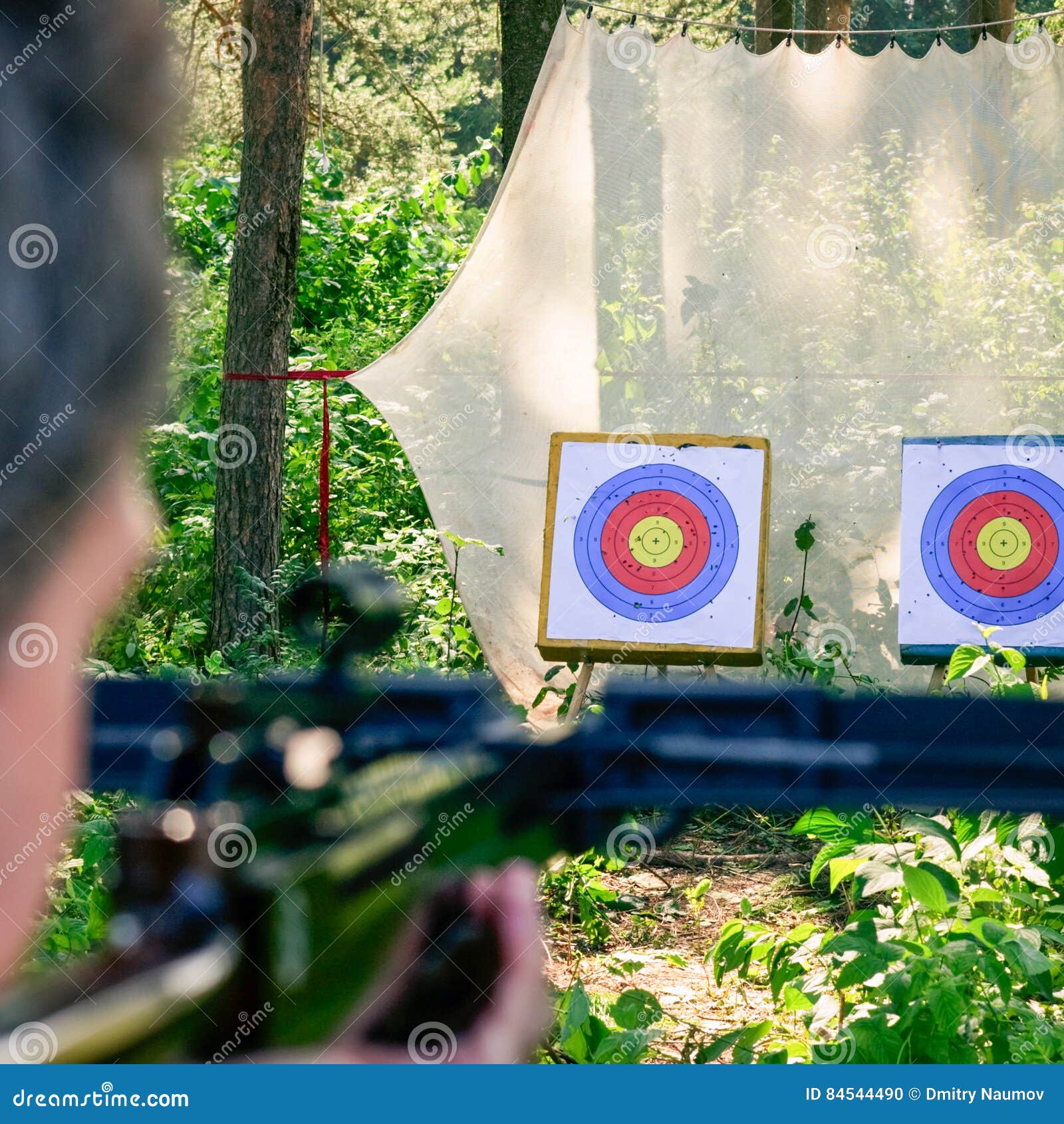 Man Aiming Crossbow at Target Stock Photo - Image of goals, practice ...