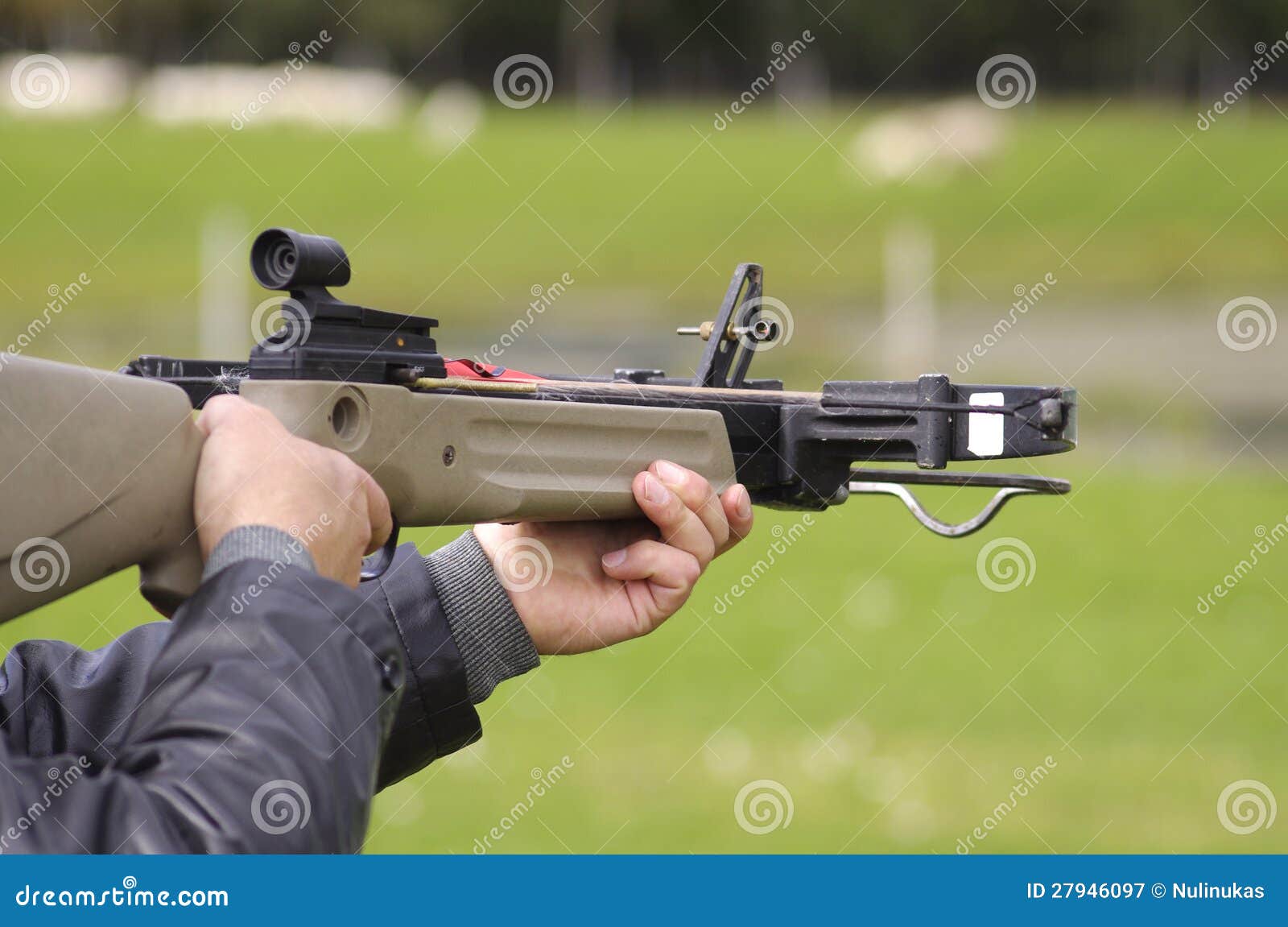 Man Aiming Crossbow at Targets Stock Image - Image of field, male: 27946097
