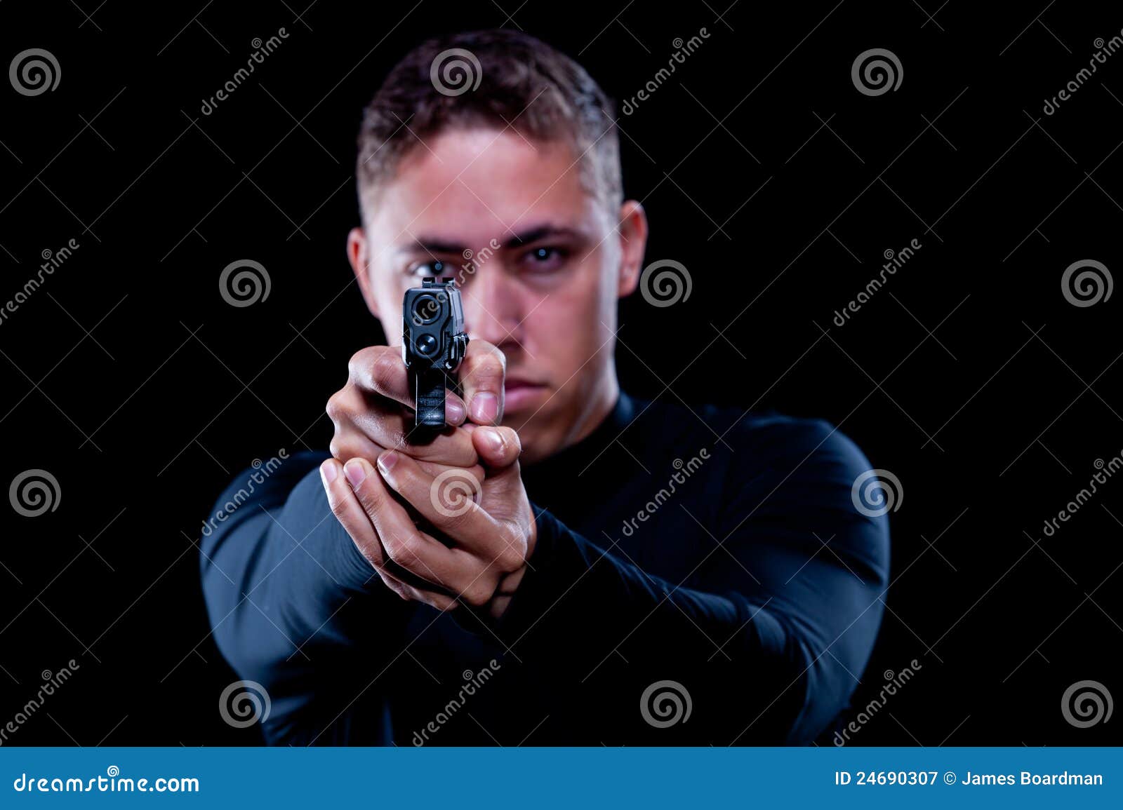 Man aiming a gun stock image. Image of trigger, black - 24690307