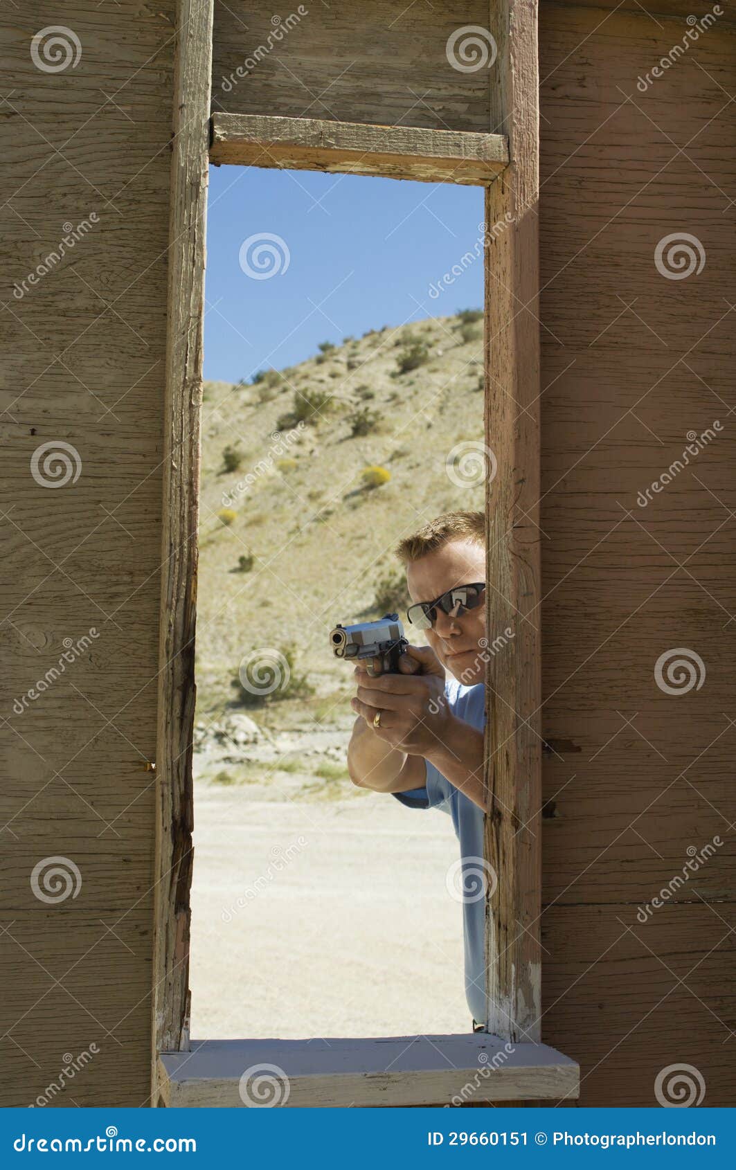 Man Aiming Hand Gun at Firing Range Stock Image - Image of military ...