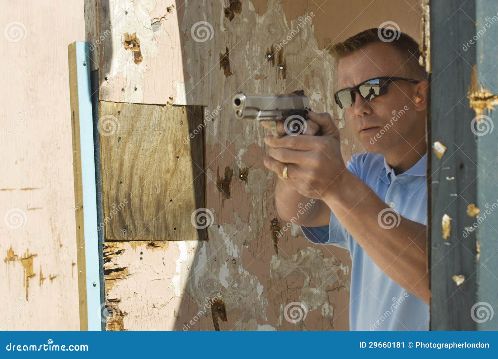 Man Aiming Hand Gun at Firing Range Stock Image - Image of officer ...