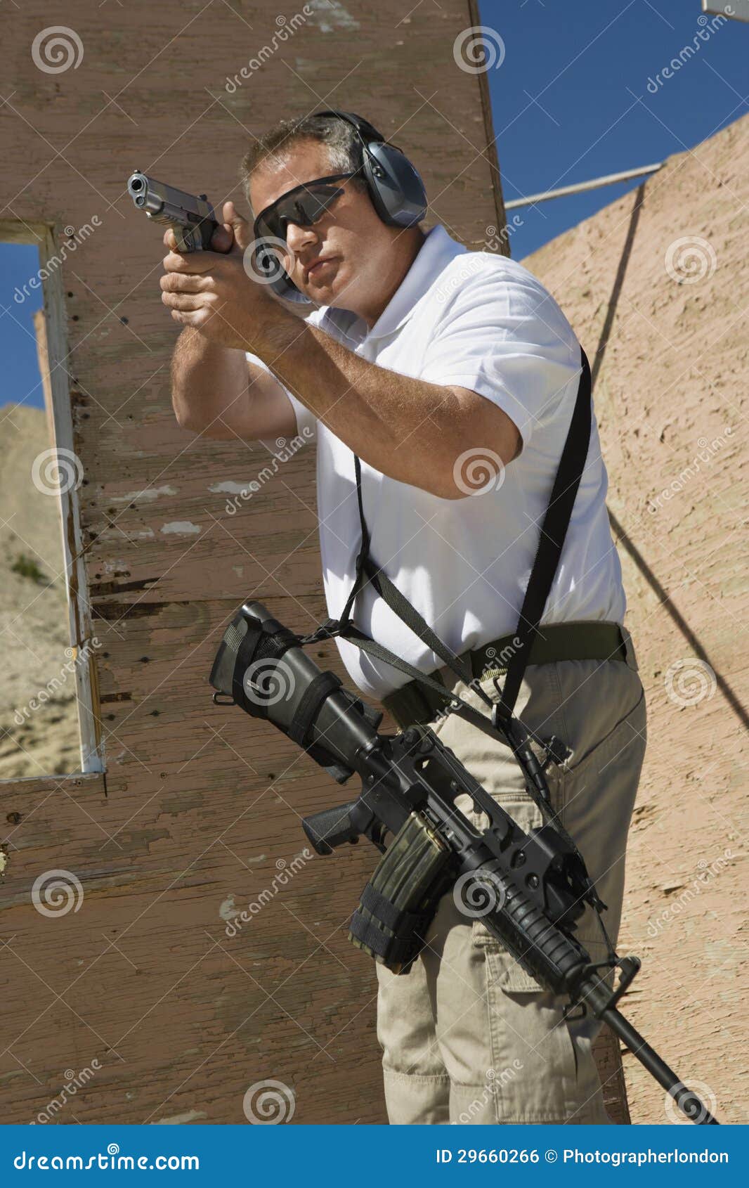 Man Aiming Hand Gun at Firing Range Stock Photo - Image of officer ...