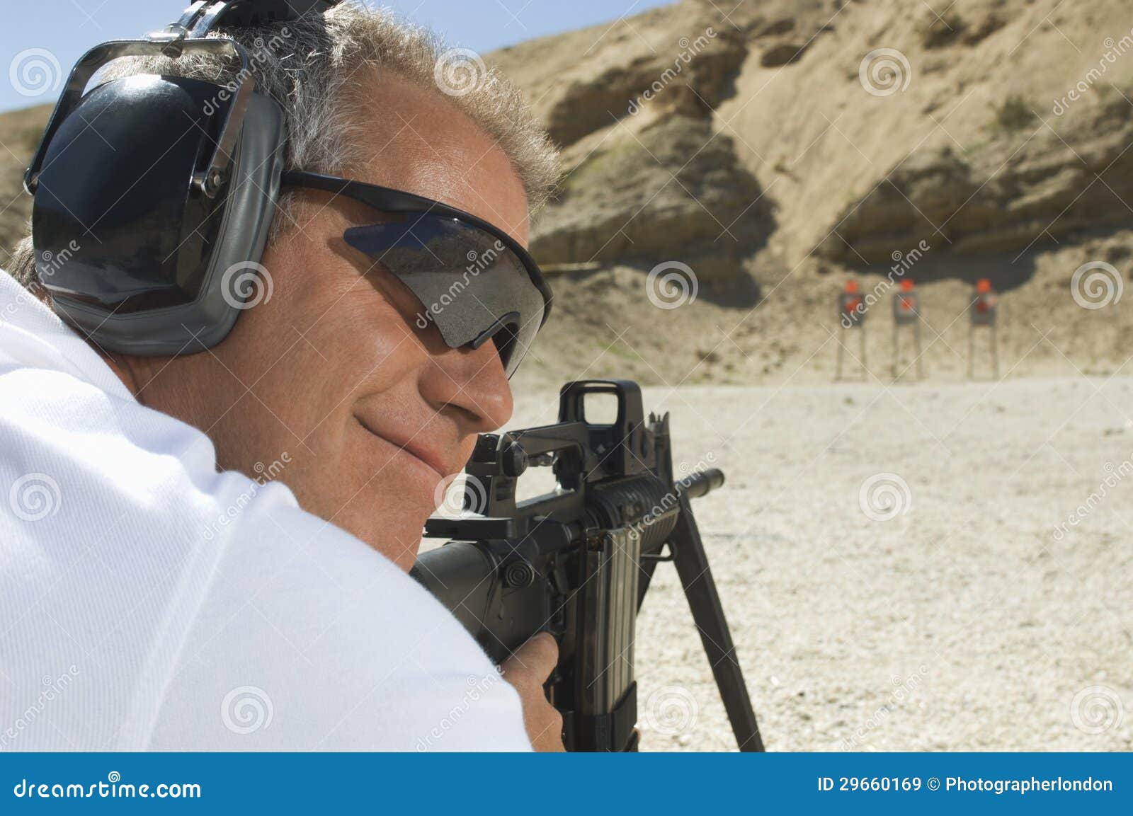 Man Aiming Machine Gun At Firing Range Royalty-Free Stock Photo ...