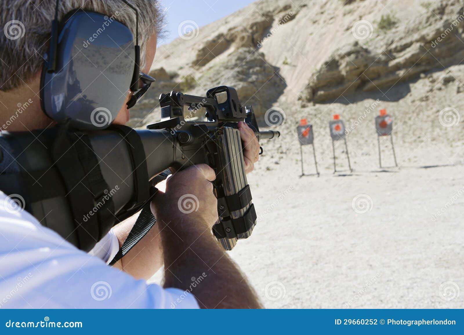 Man Aiming Machine Gun at Firing Range Stock Photo - Image of accuracy ...