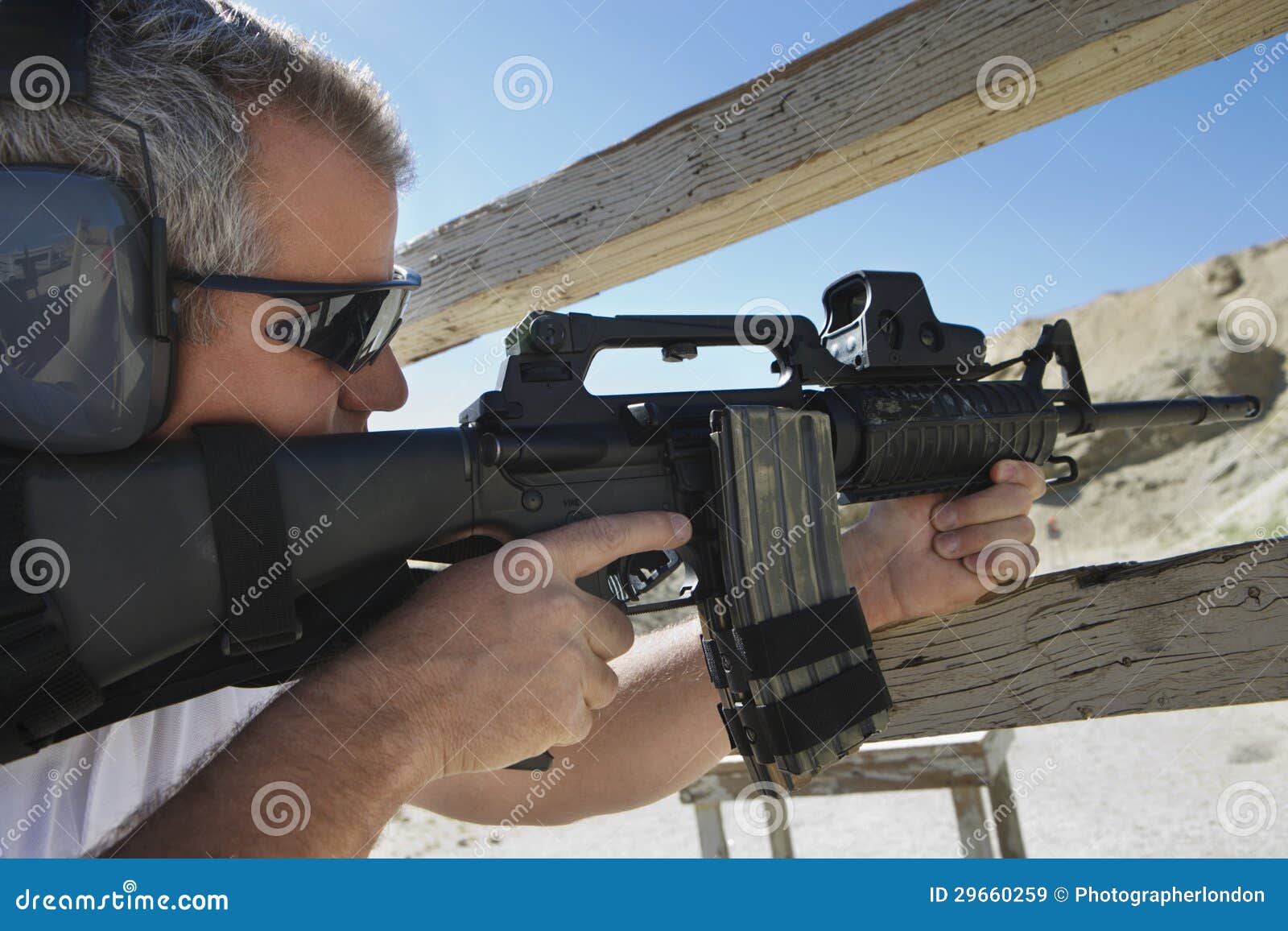 Man Aiming Machine Gun At Firing Range Royalty-Free Stock Photo ...