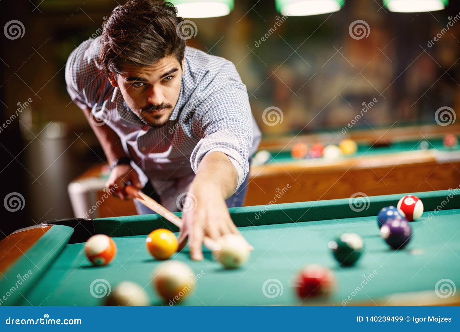Man Aiming at Pool Ball To Billiard Game Stock Image - Image of ...