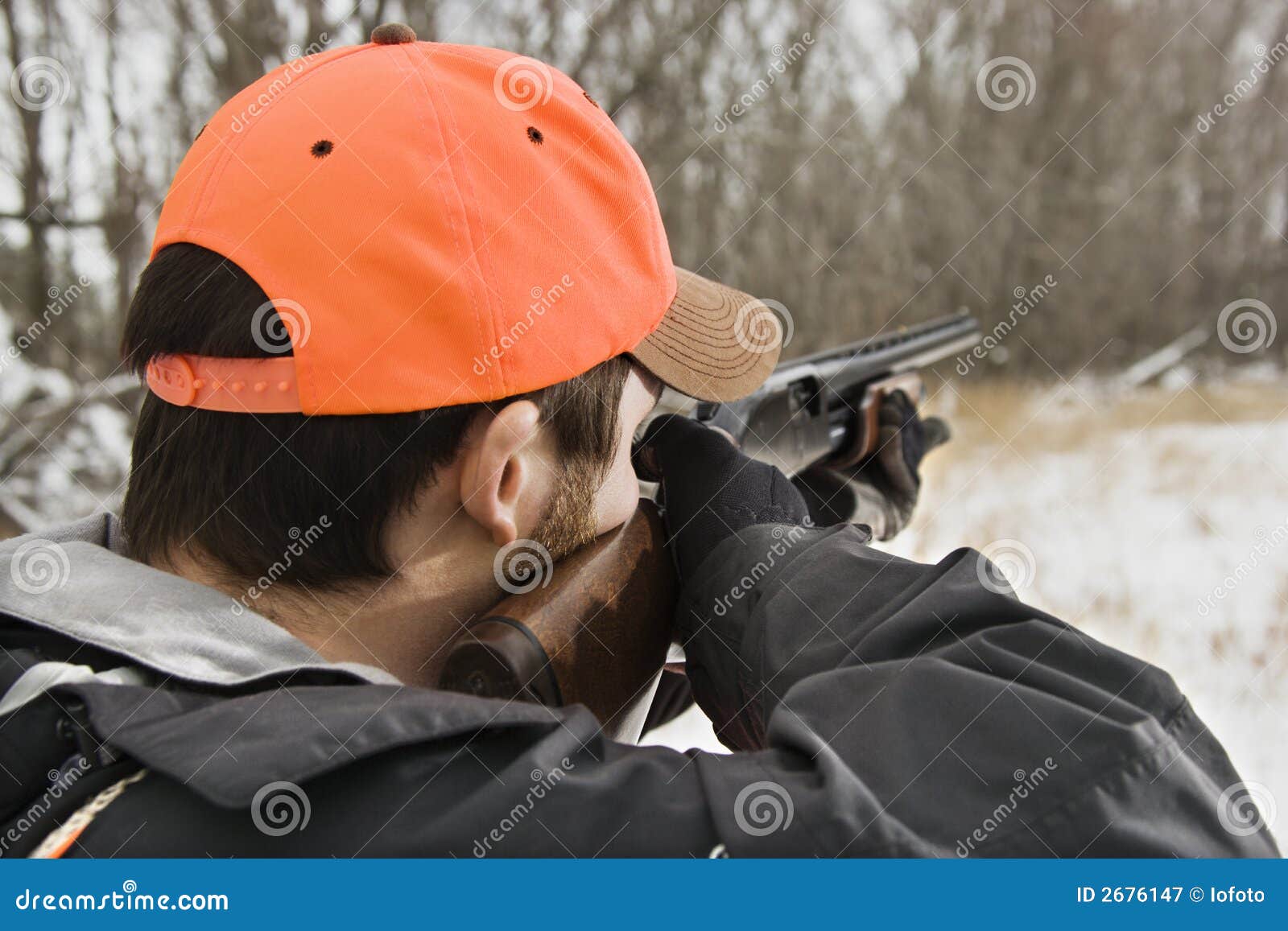 Man aiming shotgun. stock image. Image of snow, safety - 2676147