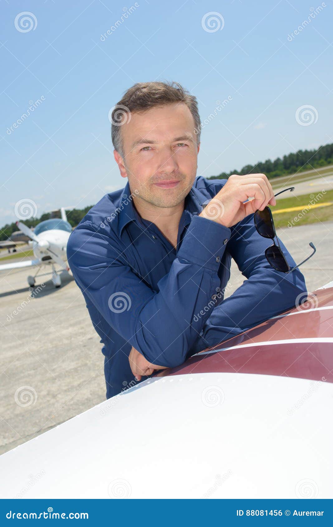 Man with Airplane in Background Stock Photo - Image of sightseeing ...