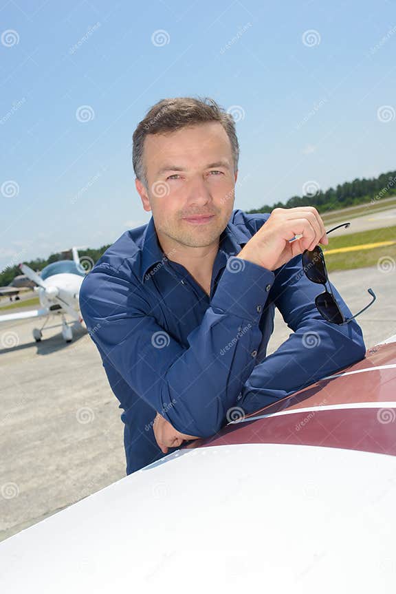 Man with Airplane in Background Stock Photo - Image of sightseeing ...