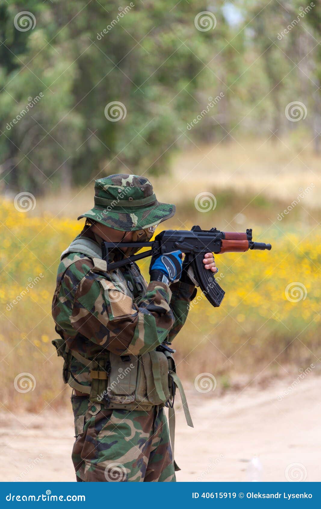 Man with AK Holds at Gunpoint Stock Image - Image of force, rifle: 40615919
