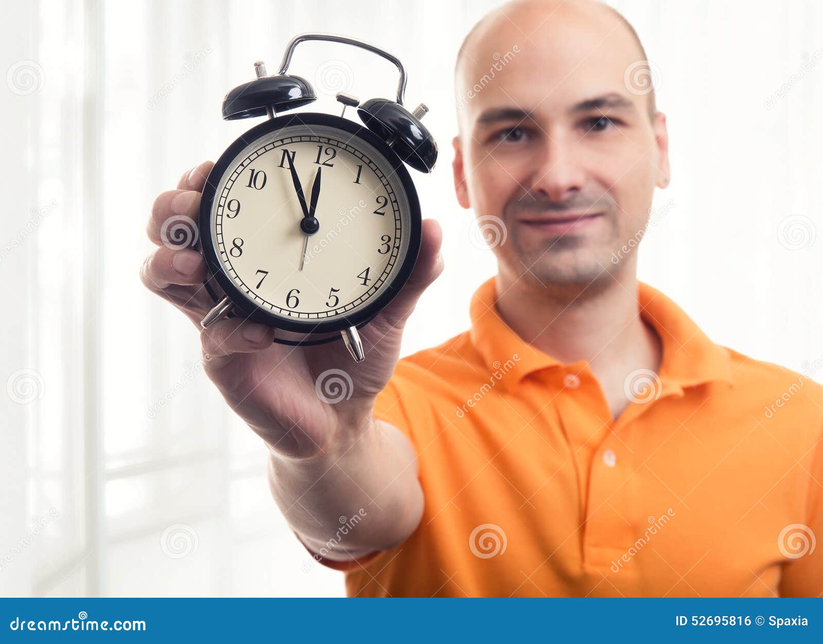 Man with alarm clock stock photo. Image of time, bald - 52695816