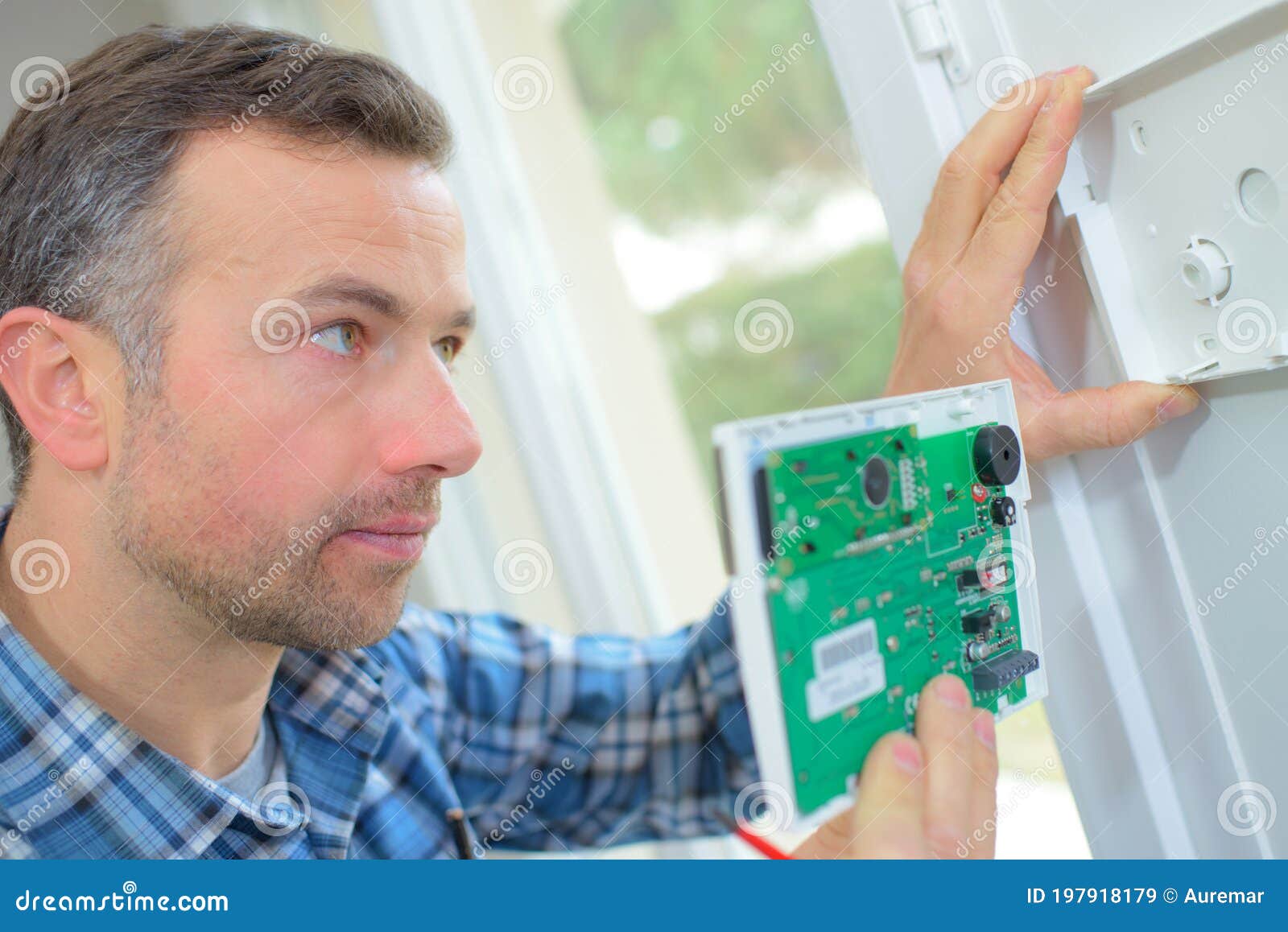 Man and Alarm Control Panel Stock Image - Image of safety, color: 197918179