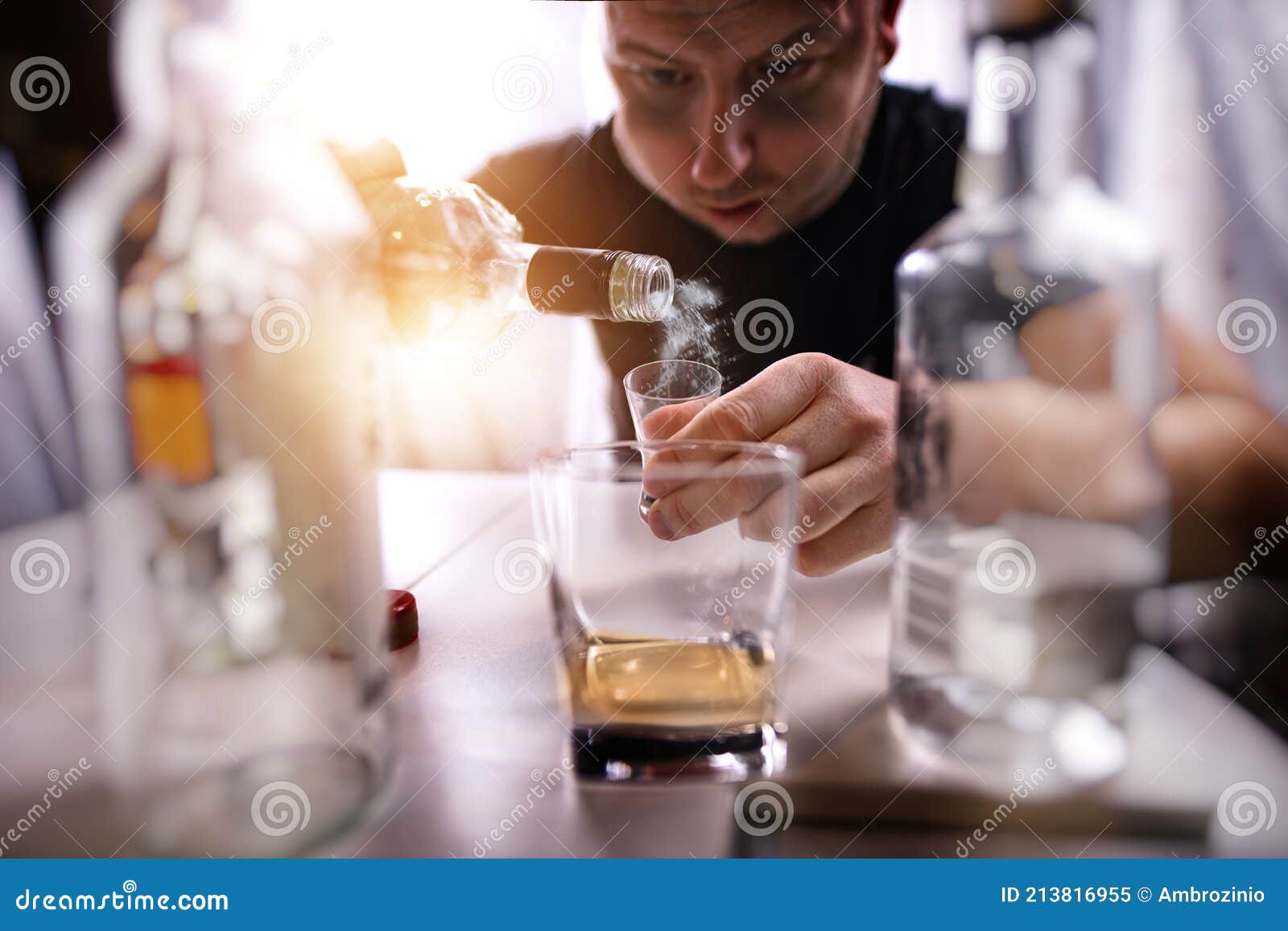 Man with Alcohol Problem Drinks Alcohol Alone in a Den Stock Image ...