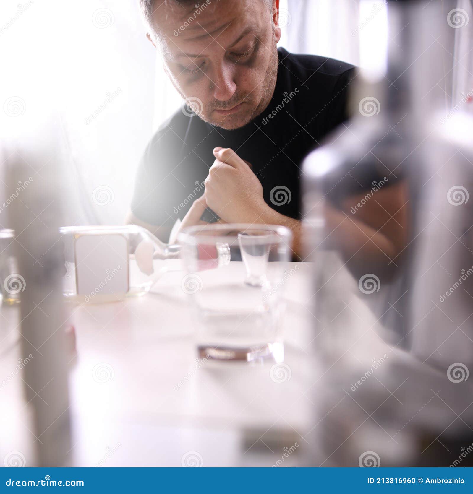 Man with Alcohol Problem Drinks Alcohol Alone in a Den Stock Photo ...