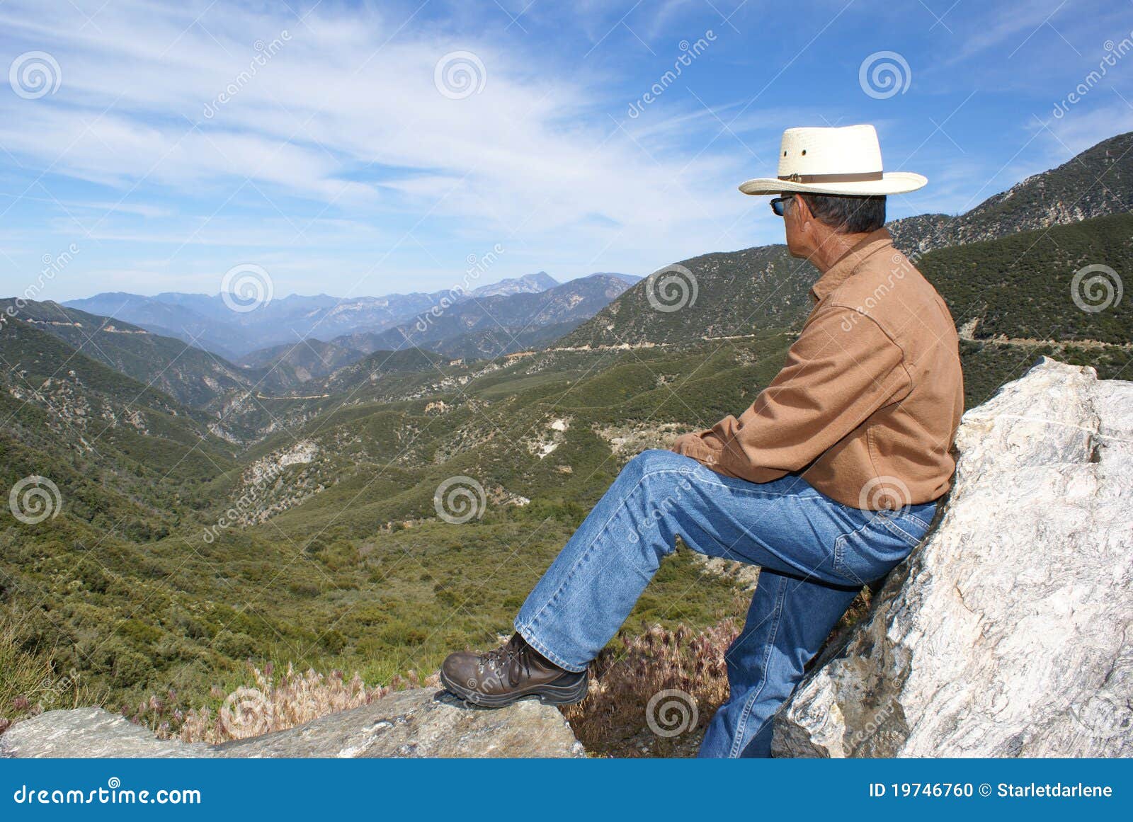Man Alone Meditating or Thinking Stock Photo - Image of brown ...