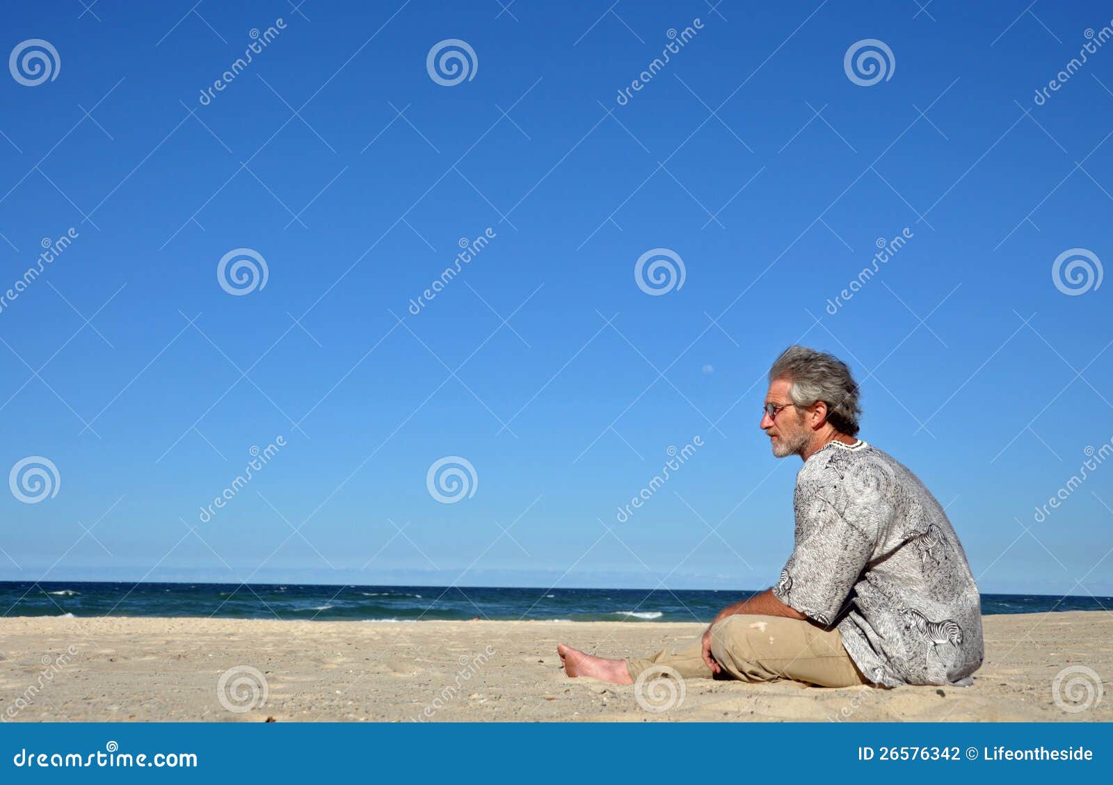 A Man Alone on White Sandy Beach Stock Photo - Image of dreaming, clear ...